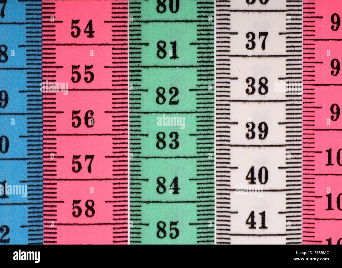 Different colors of Tailor measuring tapes Stock Photo - Alamy