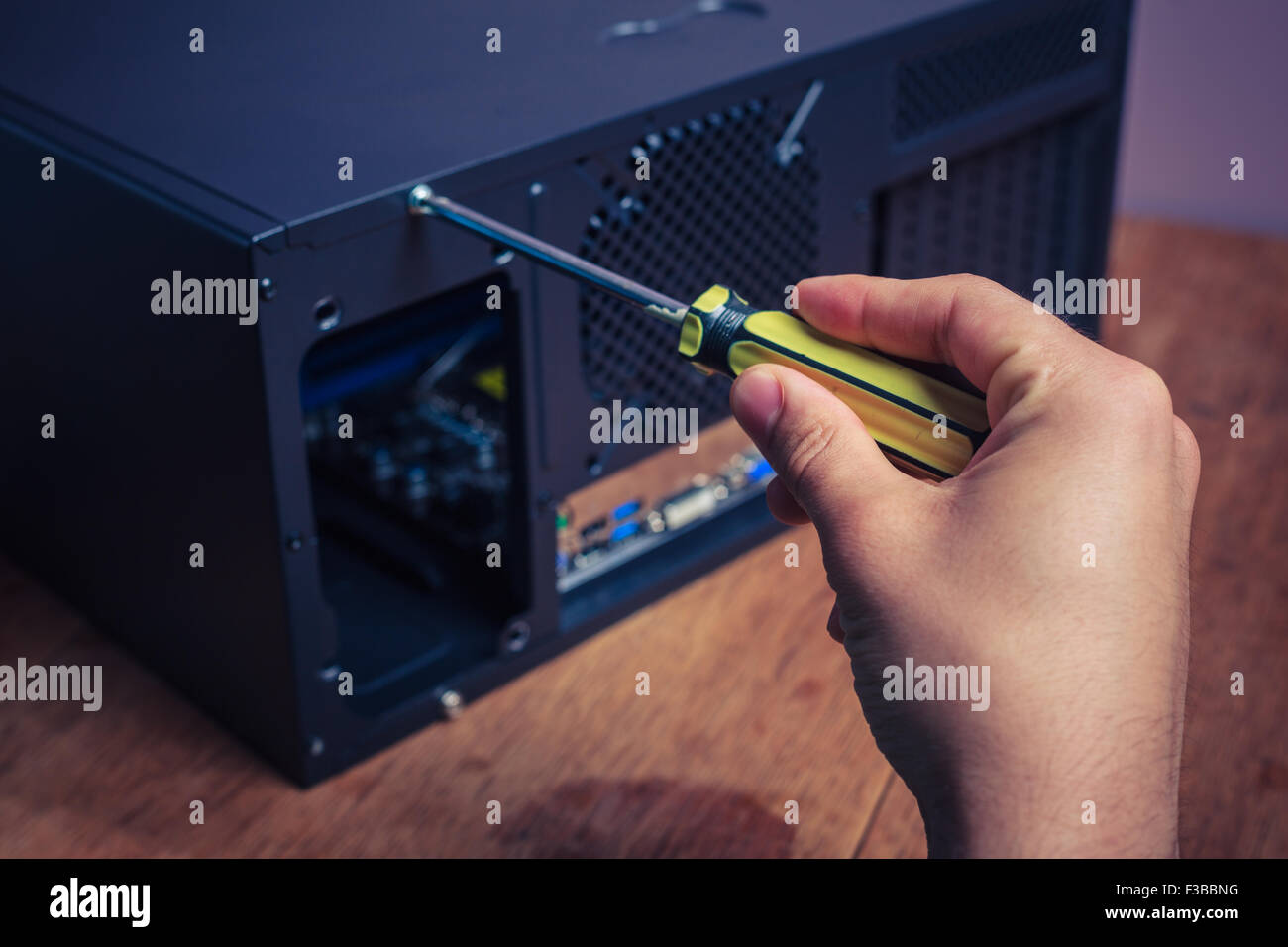 Computer engineer opening server hi-res stock photography and images ...