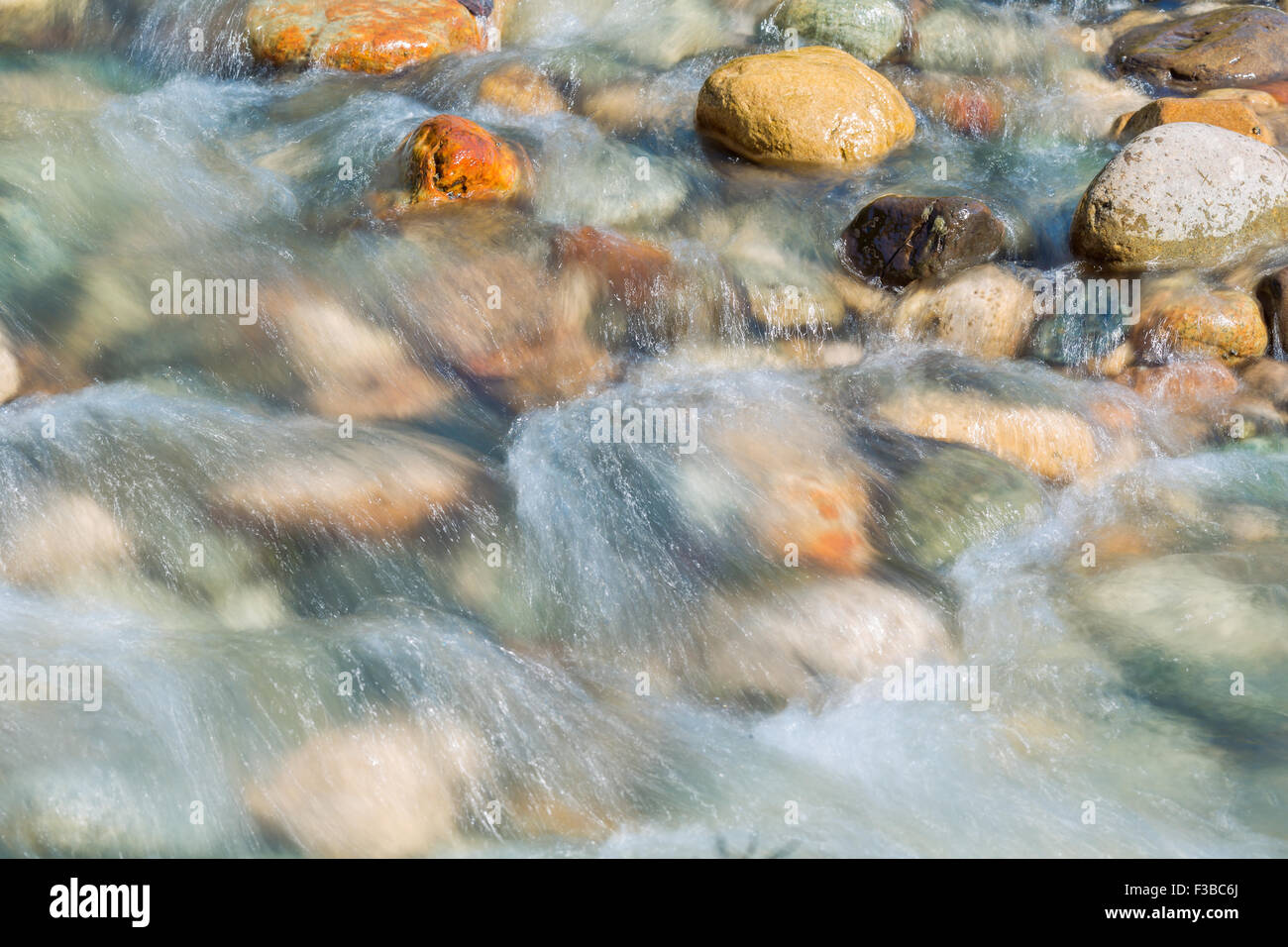 Pebble stones in the river water close up view, natural background ...