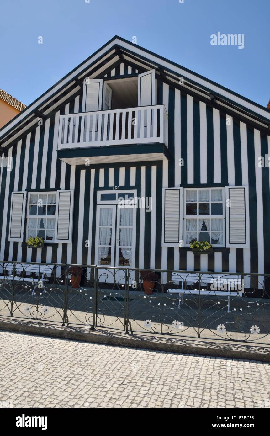 Traditional beach house in black and white coloured stripes in Costa ...