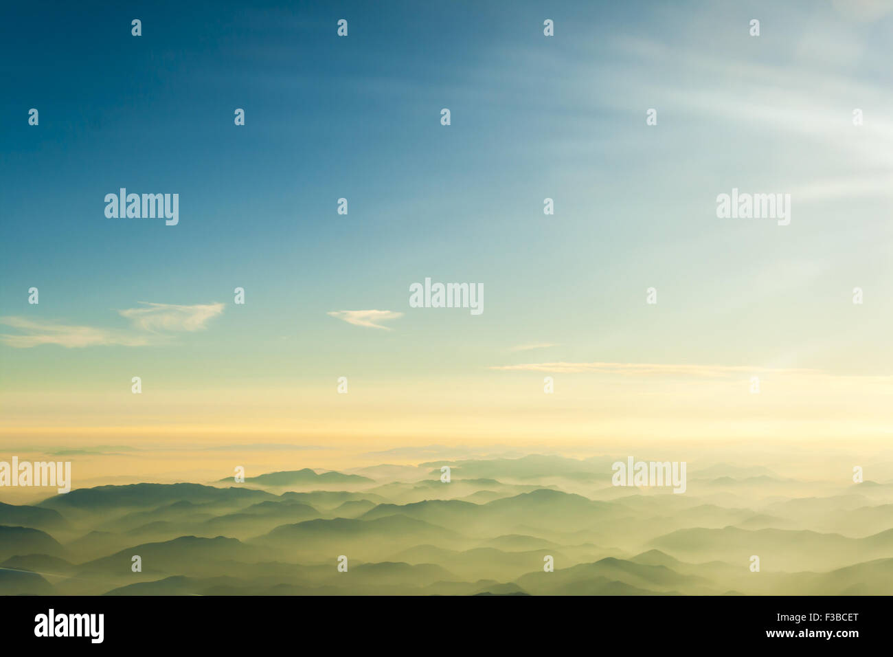 mountains clouds blue sky and fog photographed from on mountaintop ...