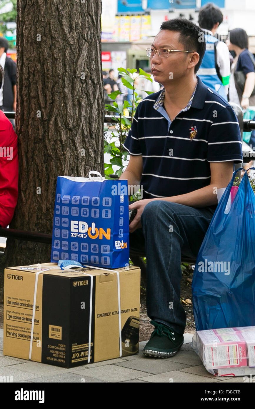 A Chinese tourist shops in Akihabara electronics shoppings district ...