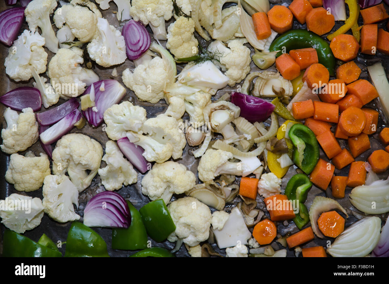 Mixed root vegetables ready for the oven Stock Photo - Alamy