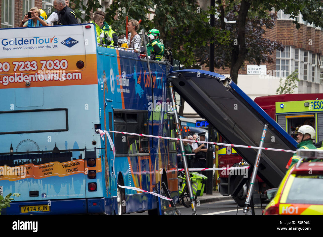 A london tour bus has had its roof ripped off by a tree at Woburn Place ...