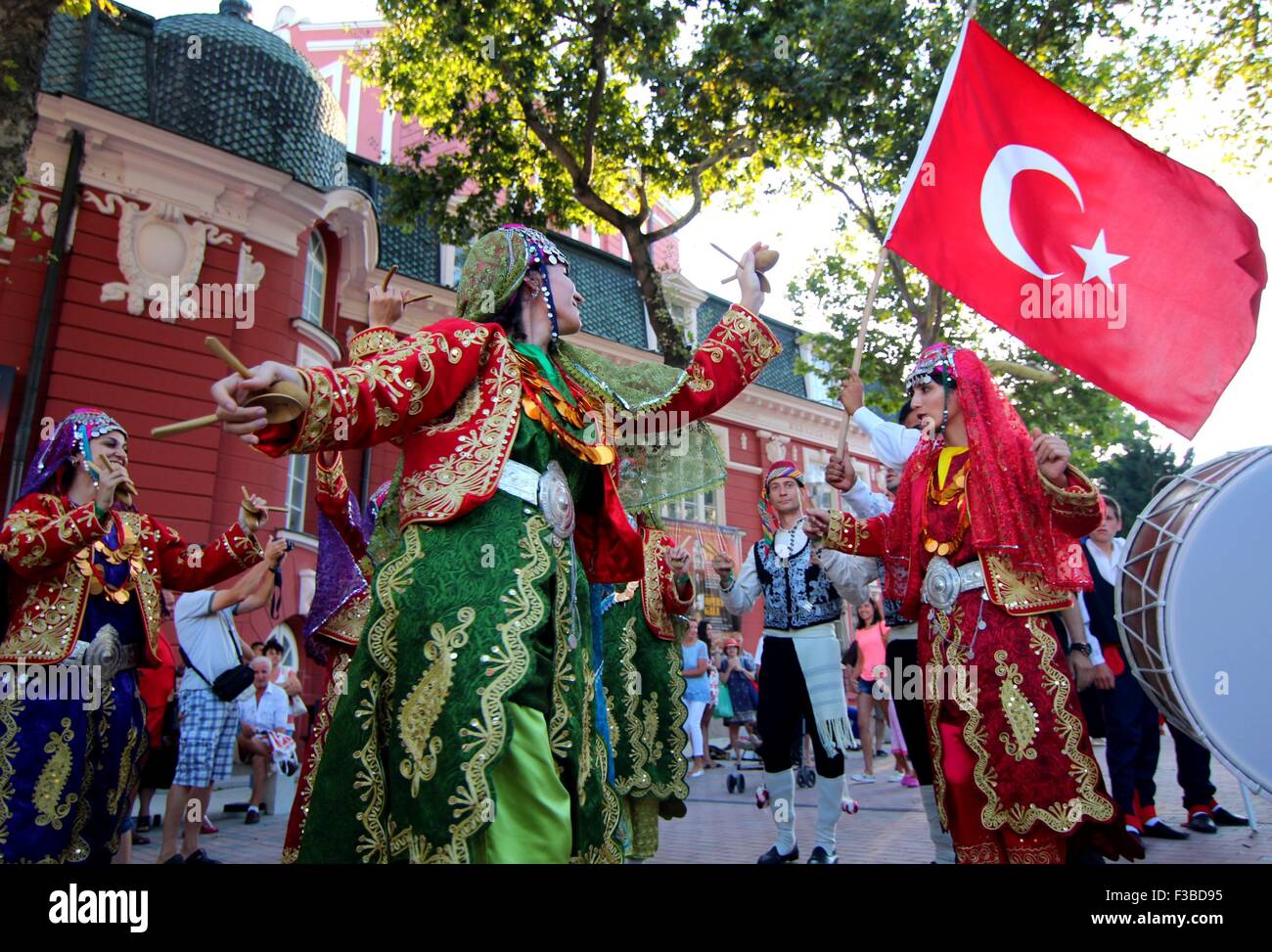 Participants take part during the 24th International Folklore Festival ...