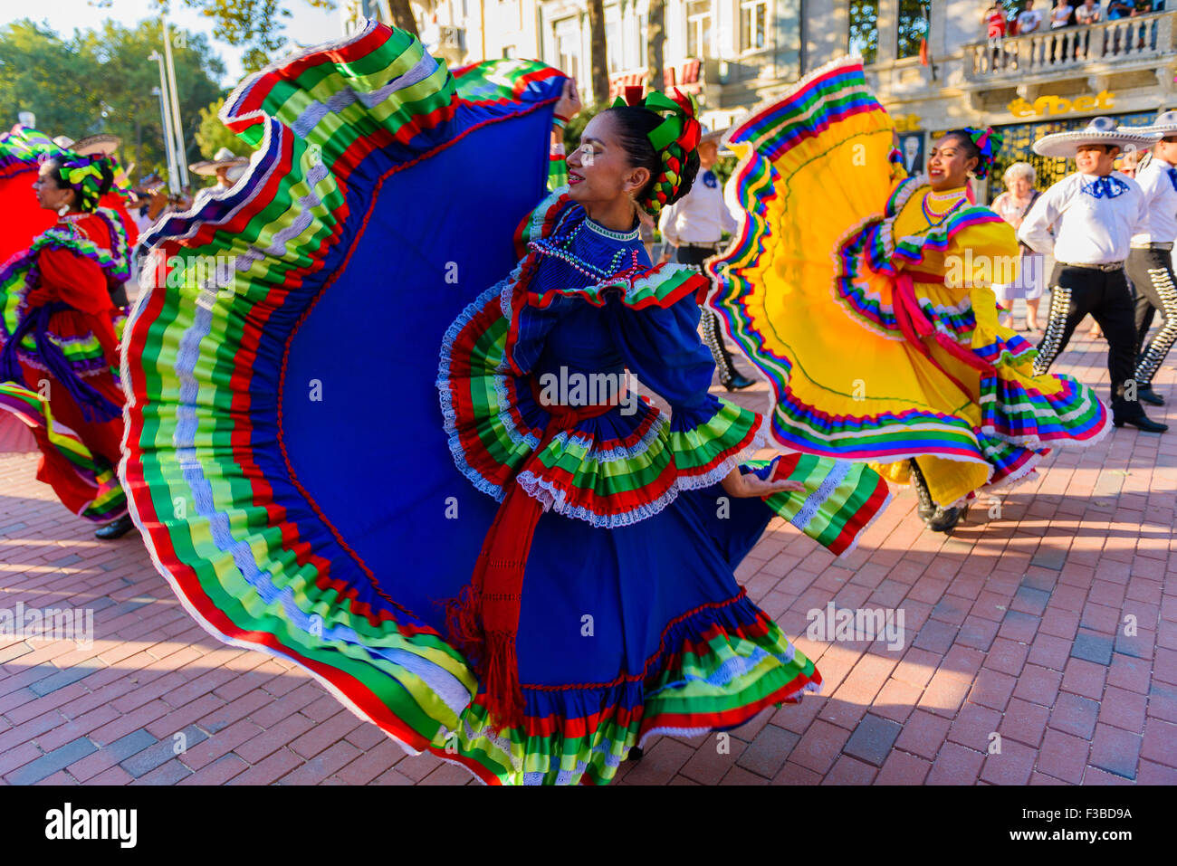Participants take part during the 24th International Folklore Festival ...