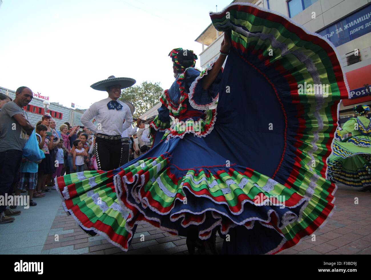 Participants take part during the 24th International Folklore Festival ...