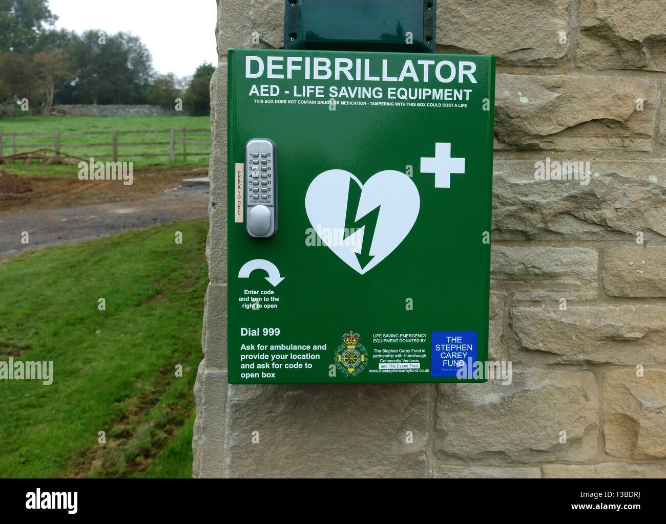 Defibrillator life-saving equipment on village hall in Northumberland ...