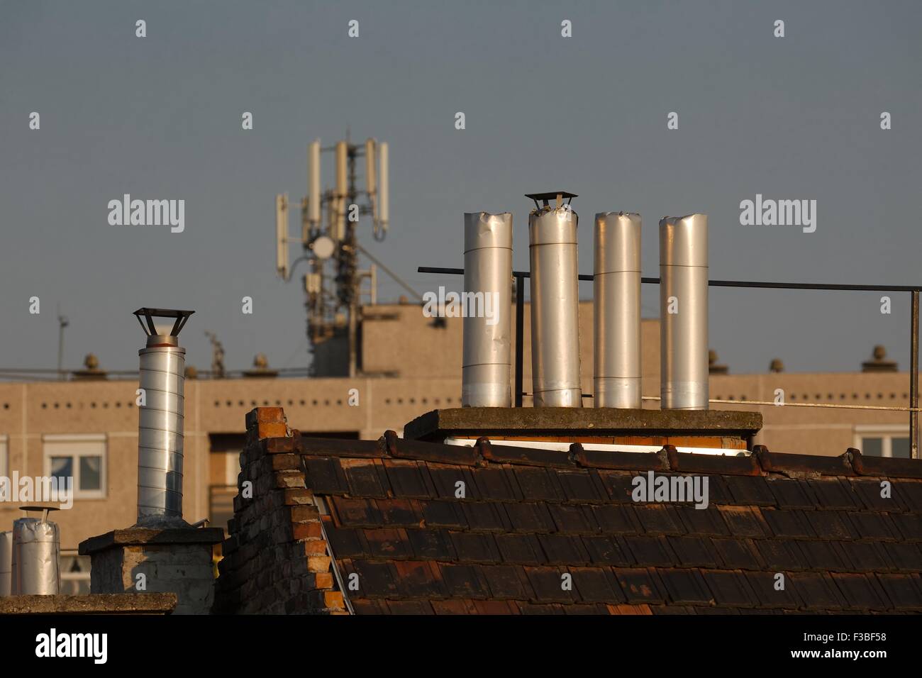 Roofs and chimneys Stock Photo - Alamy