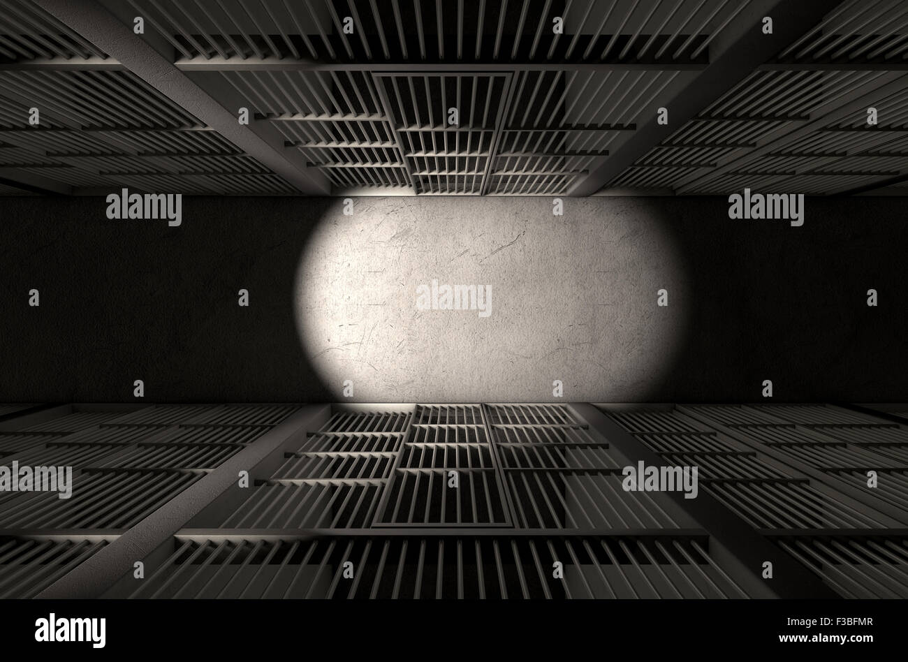 A direct top view of a row of closed jail cells between a concrete ...