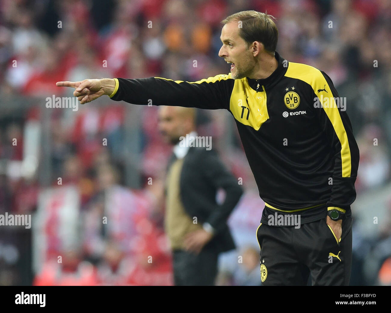 Munich, Germany. 4th Oct, 2015. Dortmund coach Thomas Tuchel gives ...