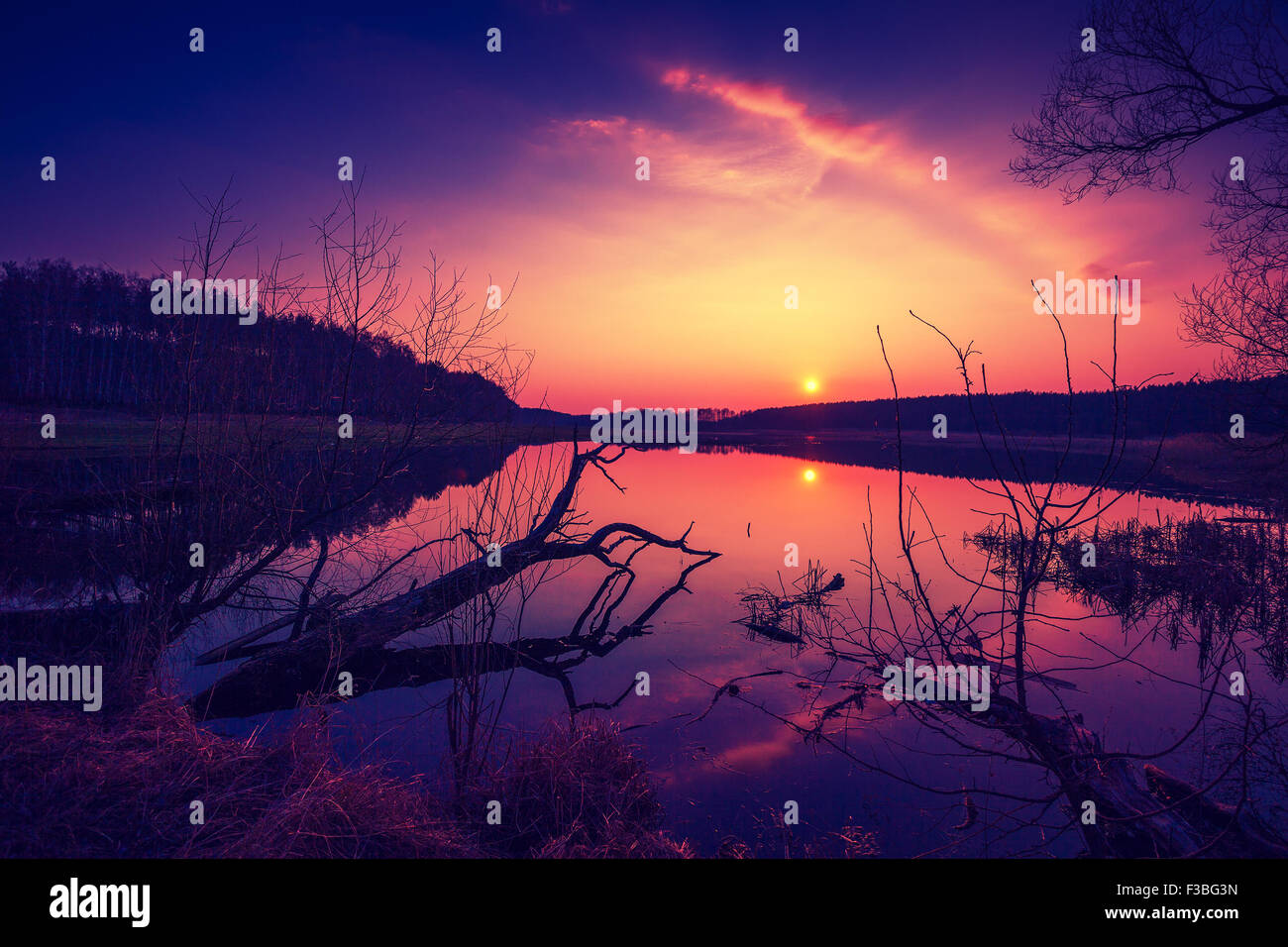 Sunrise over lake Stock Photo - Alamy