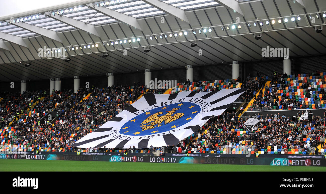Udine, Italy. 4th October, 2015. Udinese's supporters with a maxi flag ...