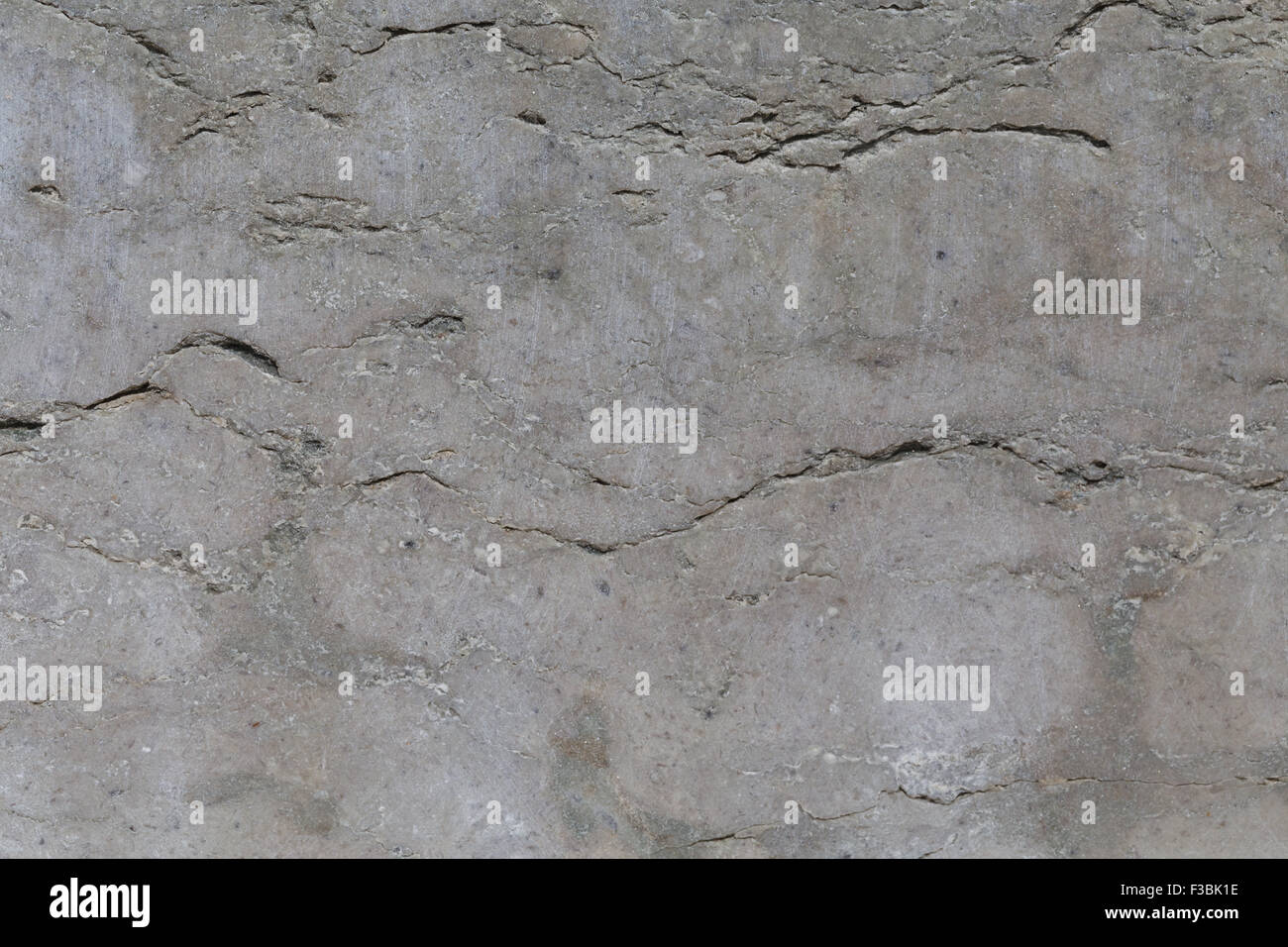 Gray stone wall closeup background photo texture Stock Photo - Alamy