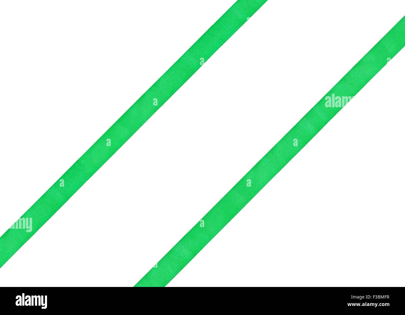 two diagonal parallel green silk bands isolated on white background ...