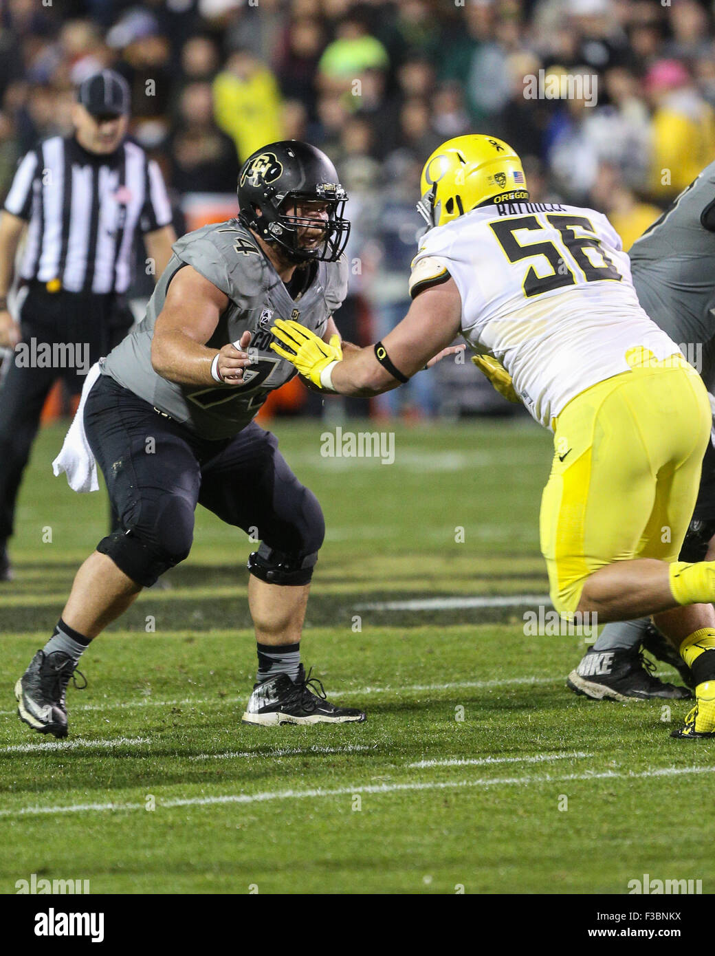 Boulder. 3rd Oct, 2015. Colorado's Alex Kelley blocks Oregon defender ...