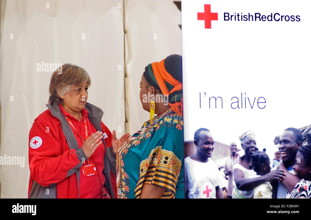 Peterborough England October 3rd 2015: Member of the Red Cross talks ...