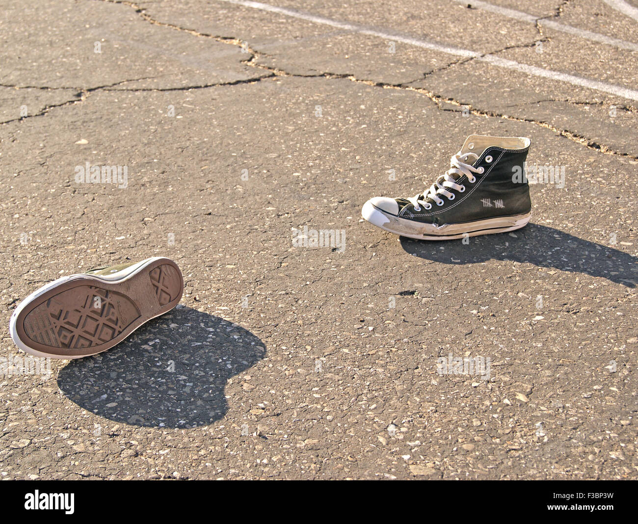 Converse on the court Stock Photo - Alamy