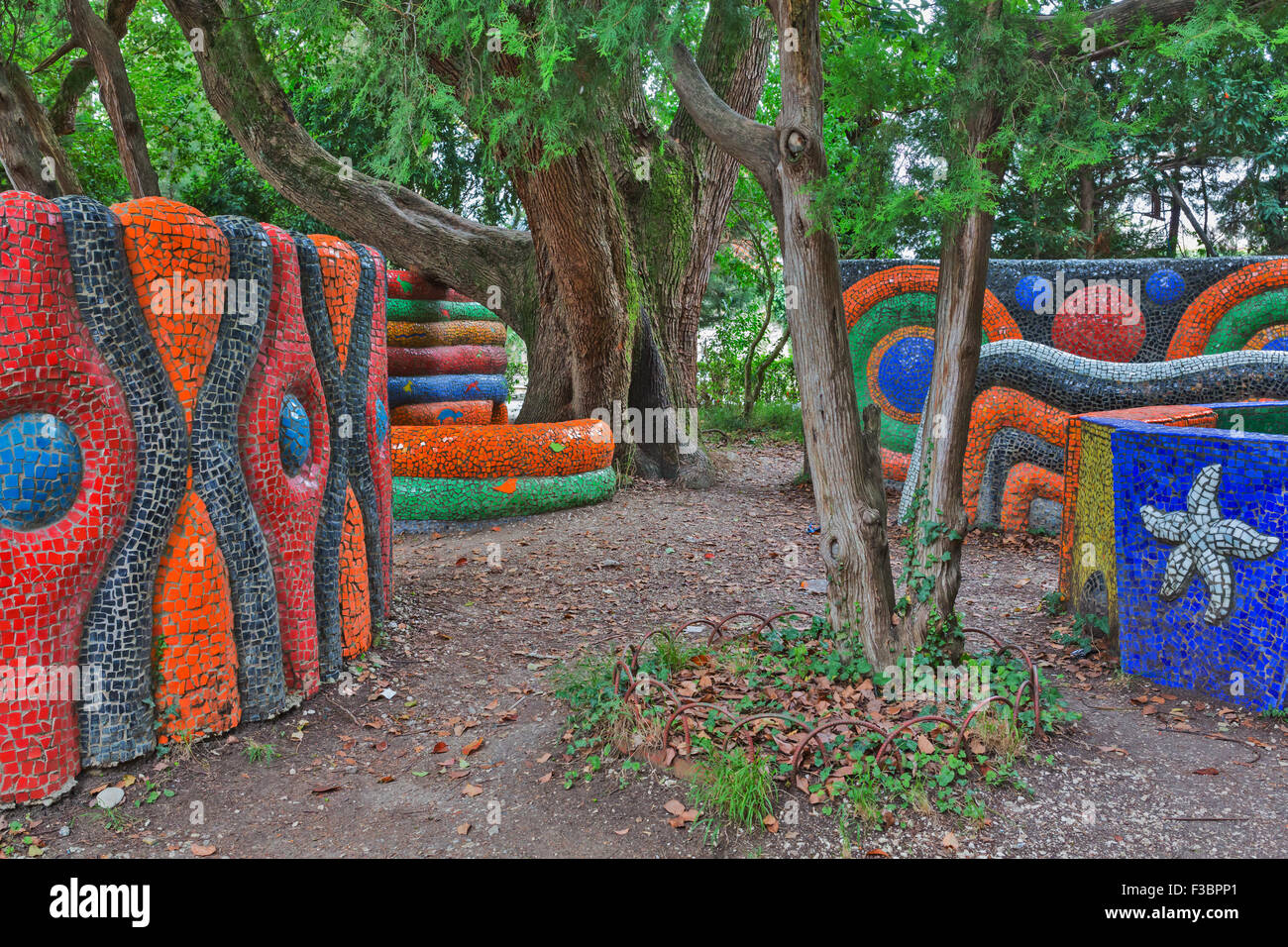 Children's playground park mosaic installation with trees Stock Photo ...