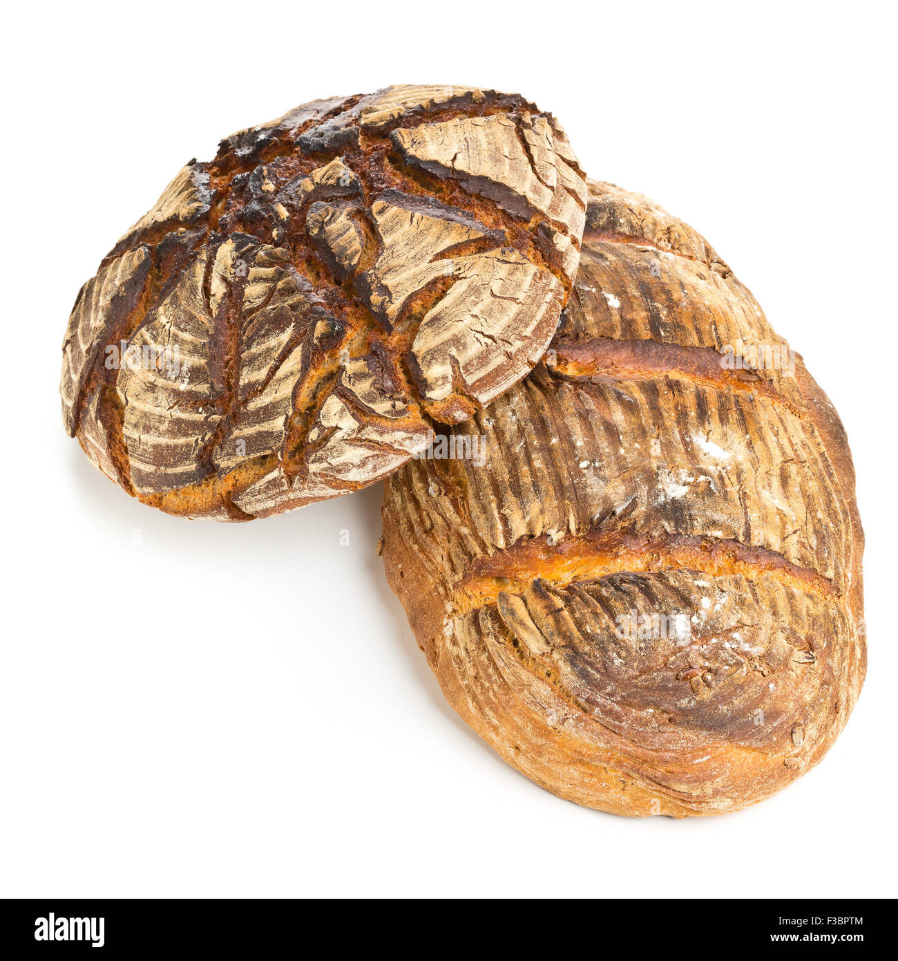 Home-made bread loaves of different flavours on white background Stock ...