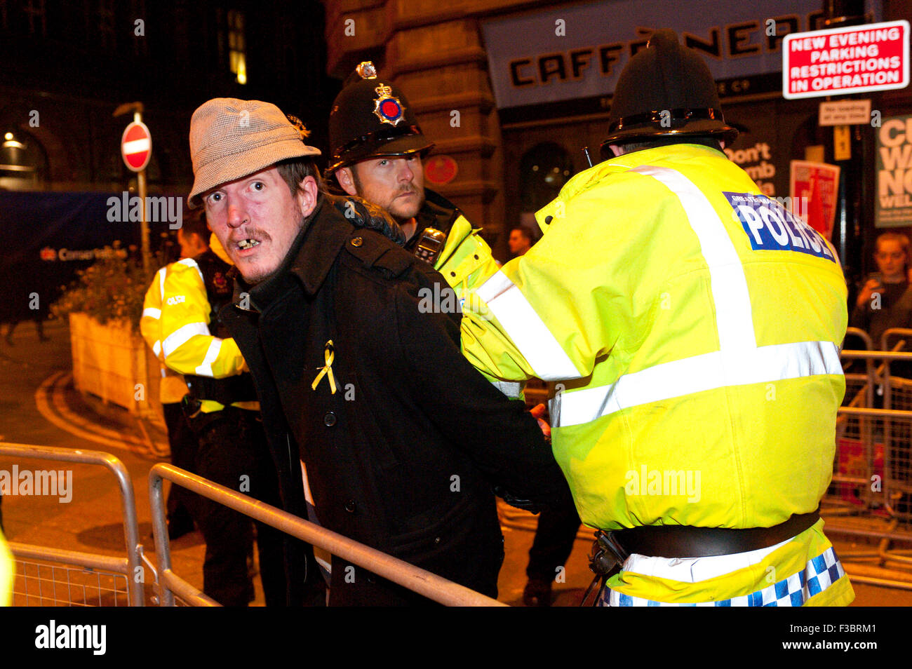 Manchester, UK. 4th October, 2015. Activist Ben Deevoy gets arrested ...