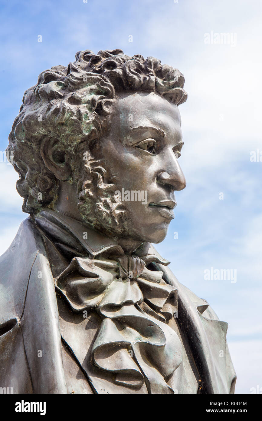 Statue of Russian poet Alexander Pushkin on blue sky background Stock ...