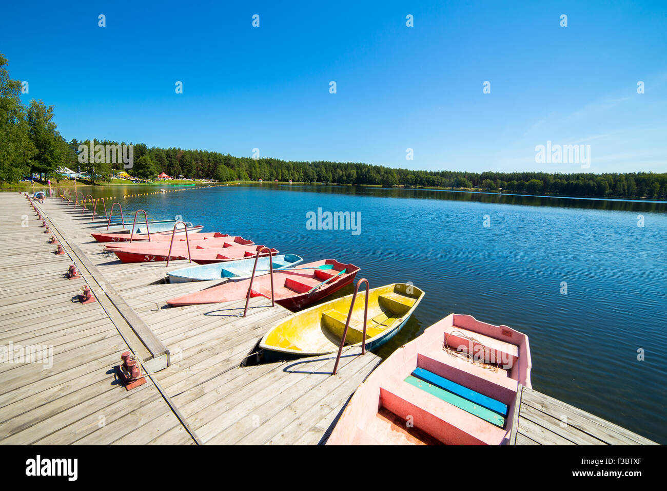 Boat station on the lake water summer Stock Photo - Alamy