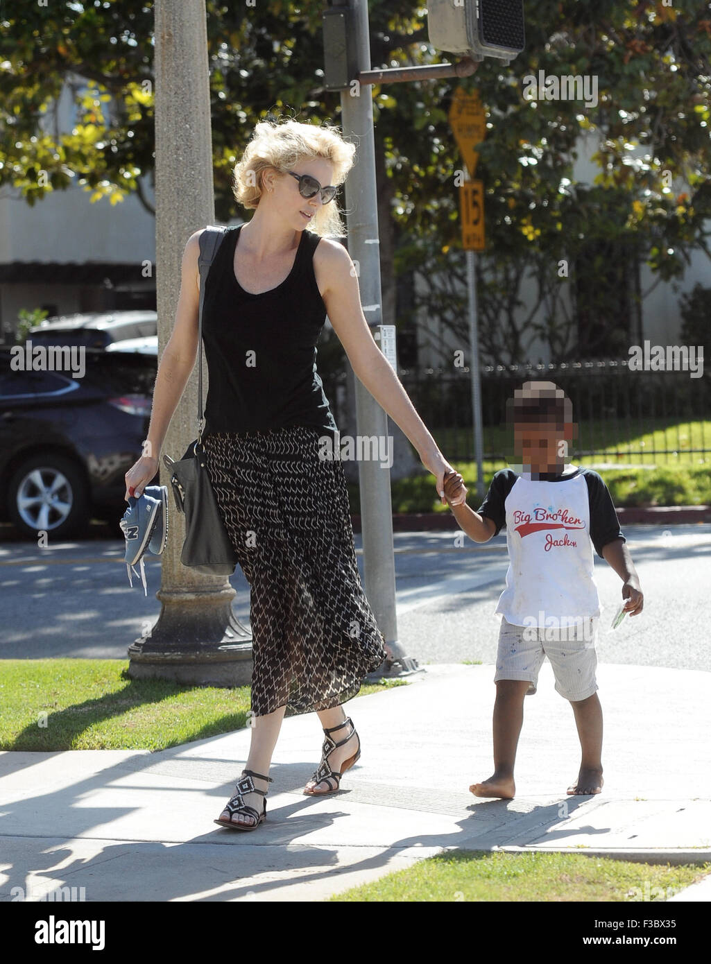Charlize Theron Son Walking