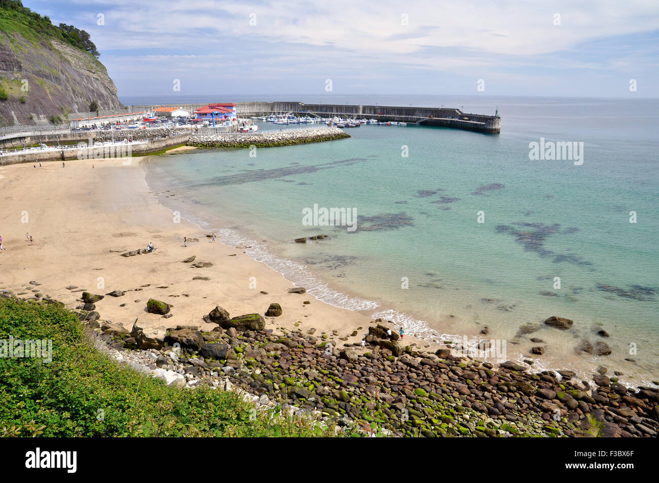 Panoramic view of Lastres seaport and El Escanu beach (Colunga ...