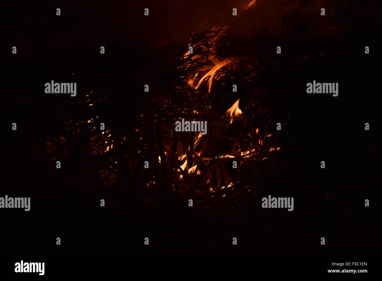 Fire fire. Burning of rice straw at night Stock Photo - Alamy