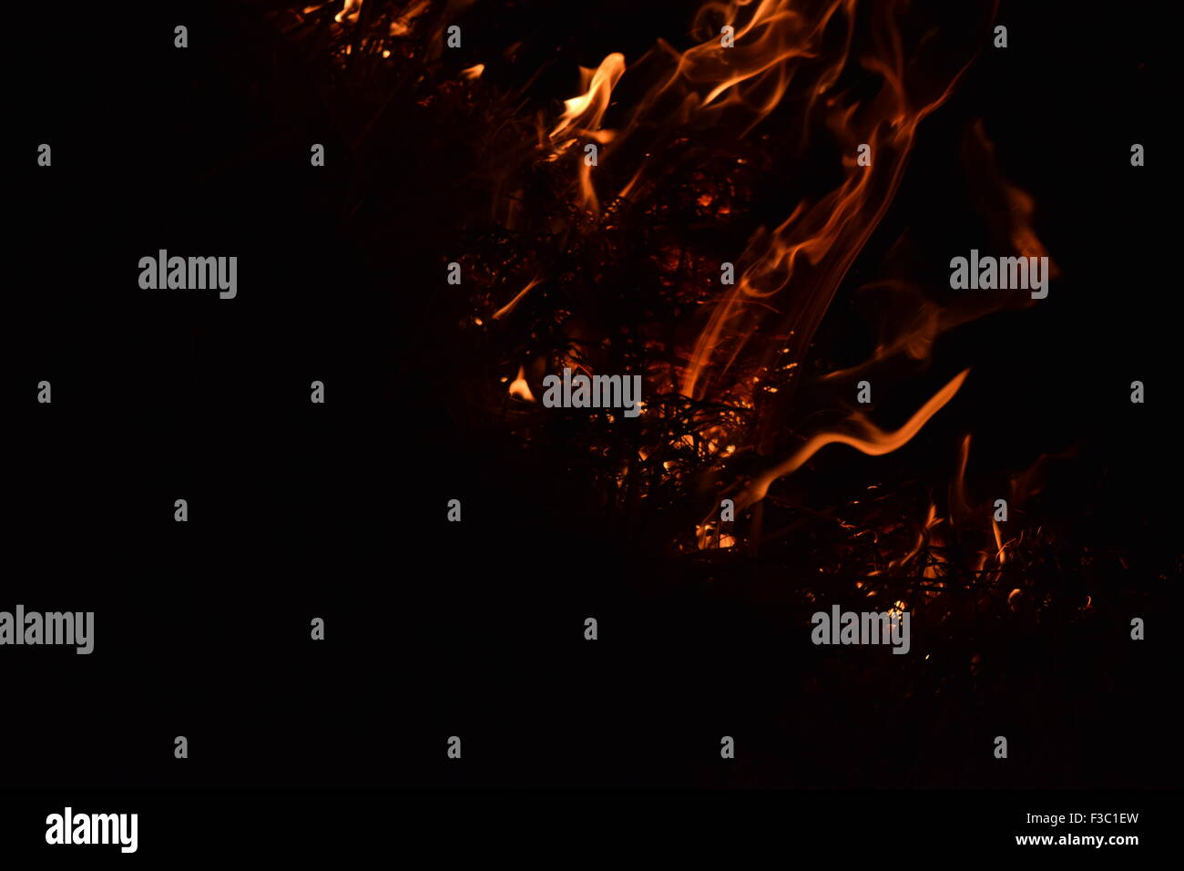 Fire fire. Burning of rice straw at night Stock Photo - Alamy