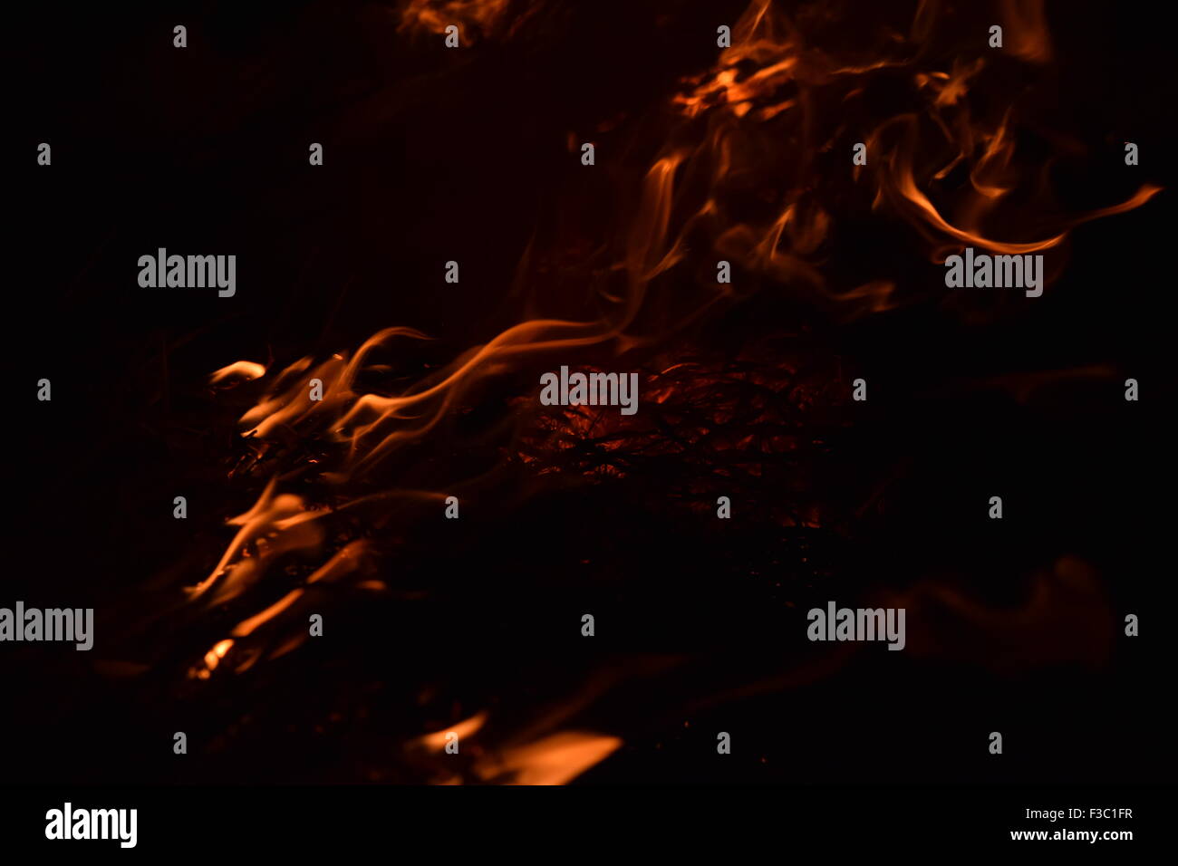 Fire fire. Burning of rice straw at night Stock Photo - Alamy