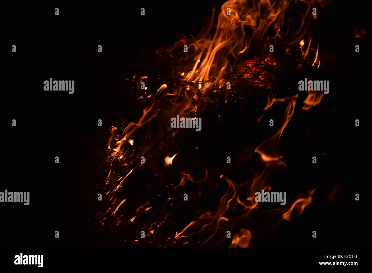 Fire fire. Burning of rice straw at night Stock Photo - Alamy