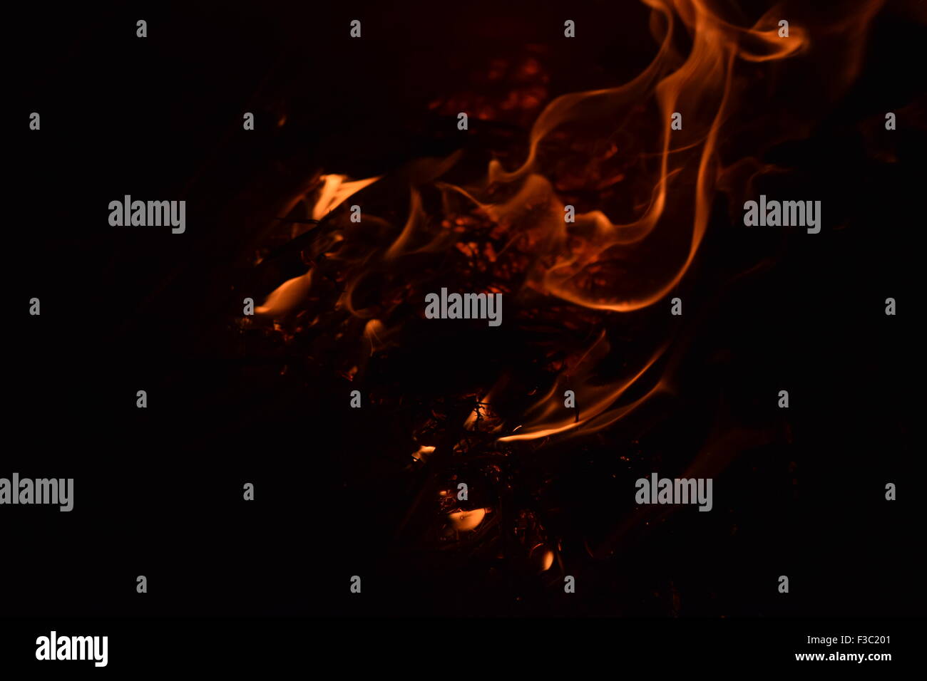 Fire fire. Burning of rice straw at night Stock Photo - Alamy