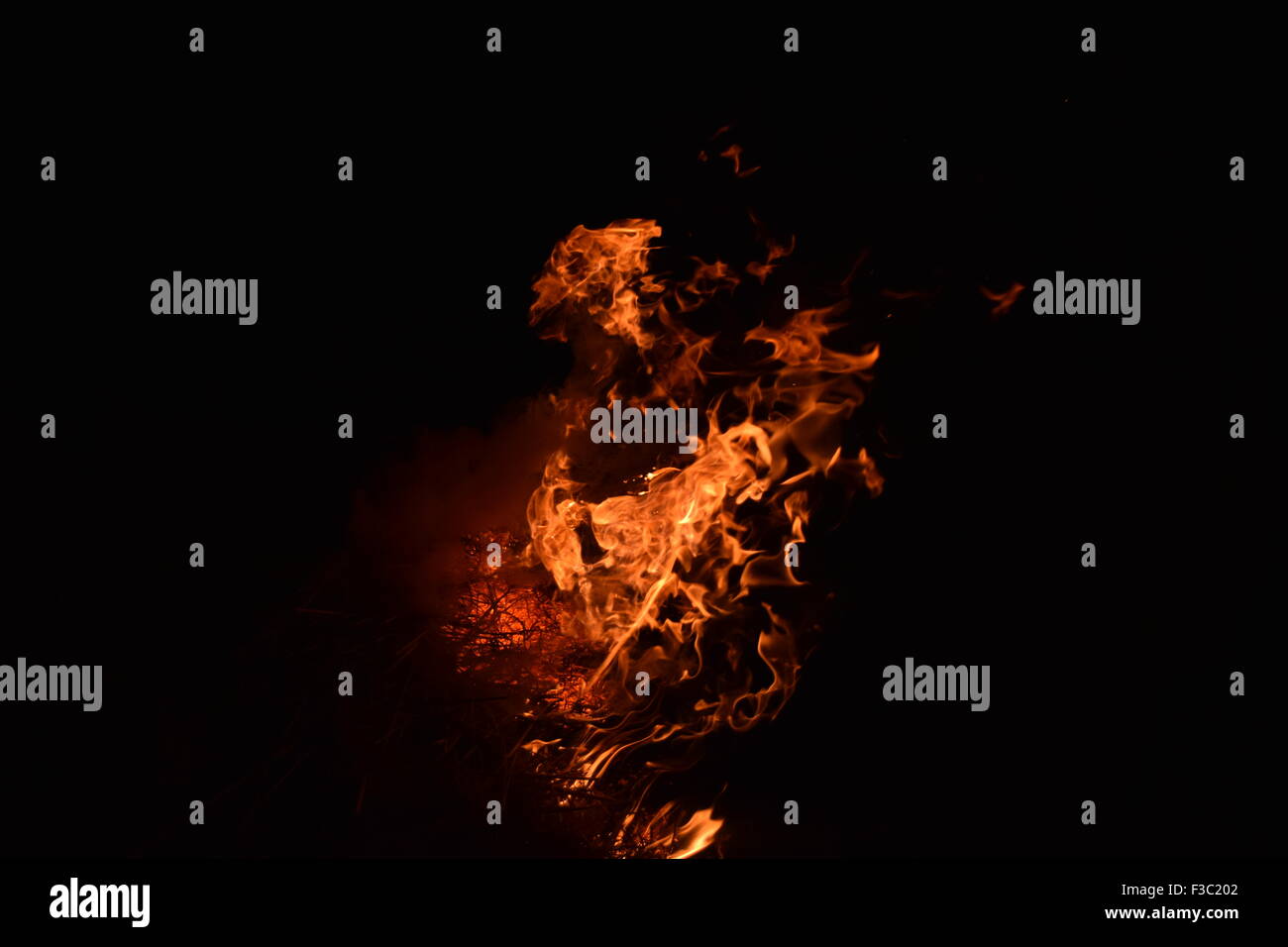 Fire fire. Burning of rice straw at night Stock Photo - Alamy