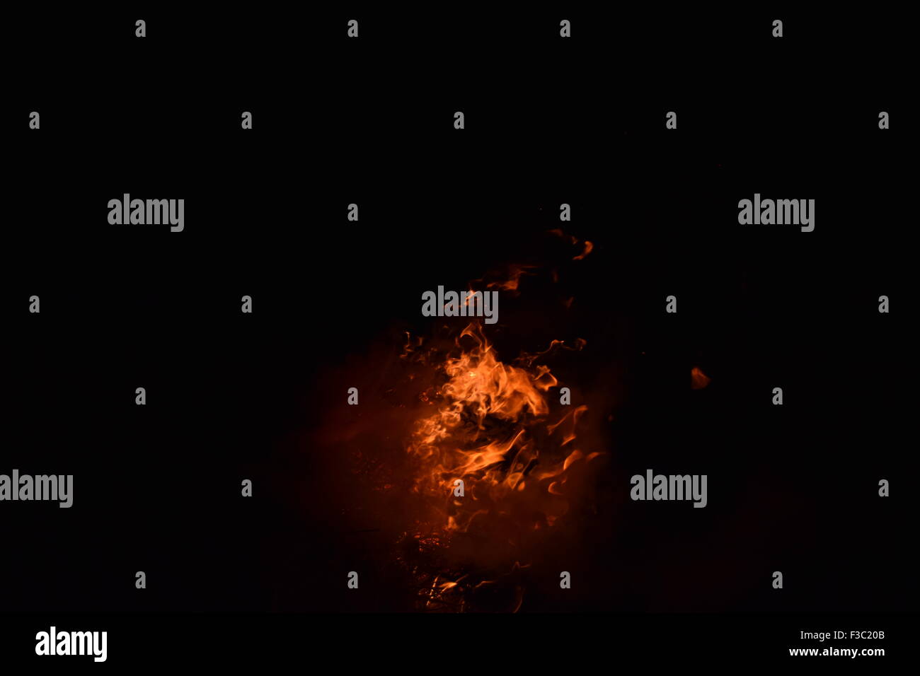 Fire fire. Burning of rice straw at night Stock Photo - Alamy