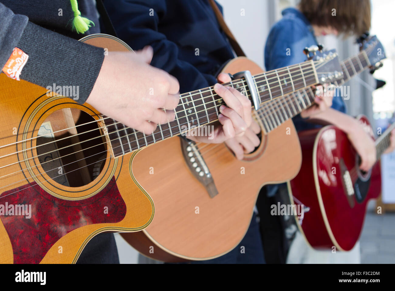 Young man busker playing classical hi-res stock photography and images ...