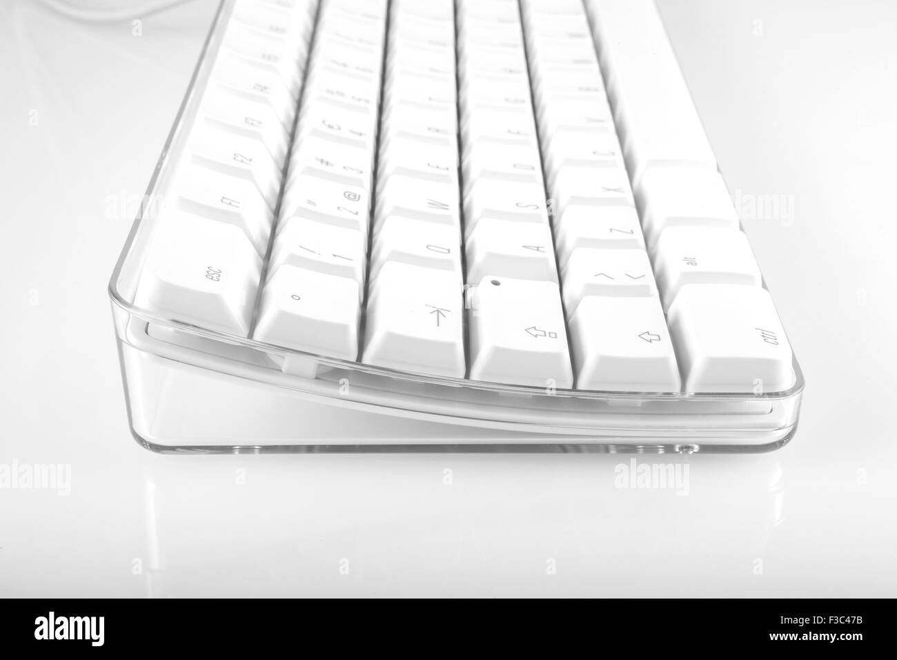 White computer keyboard on white background Stock Photo - Alamy