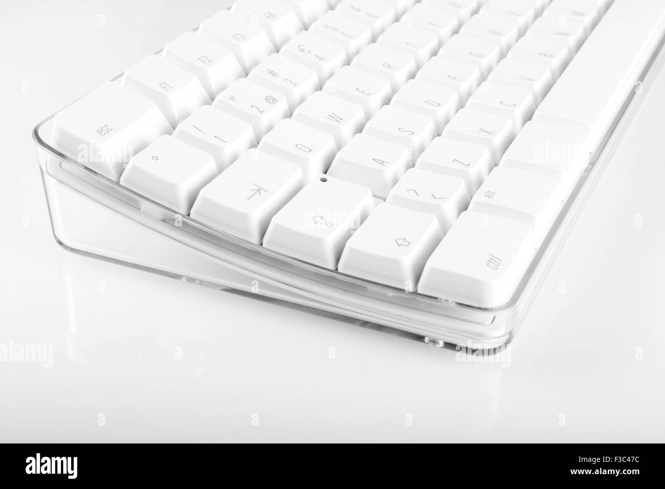 White computer keyboard on white background Stock Photo - Alamy
