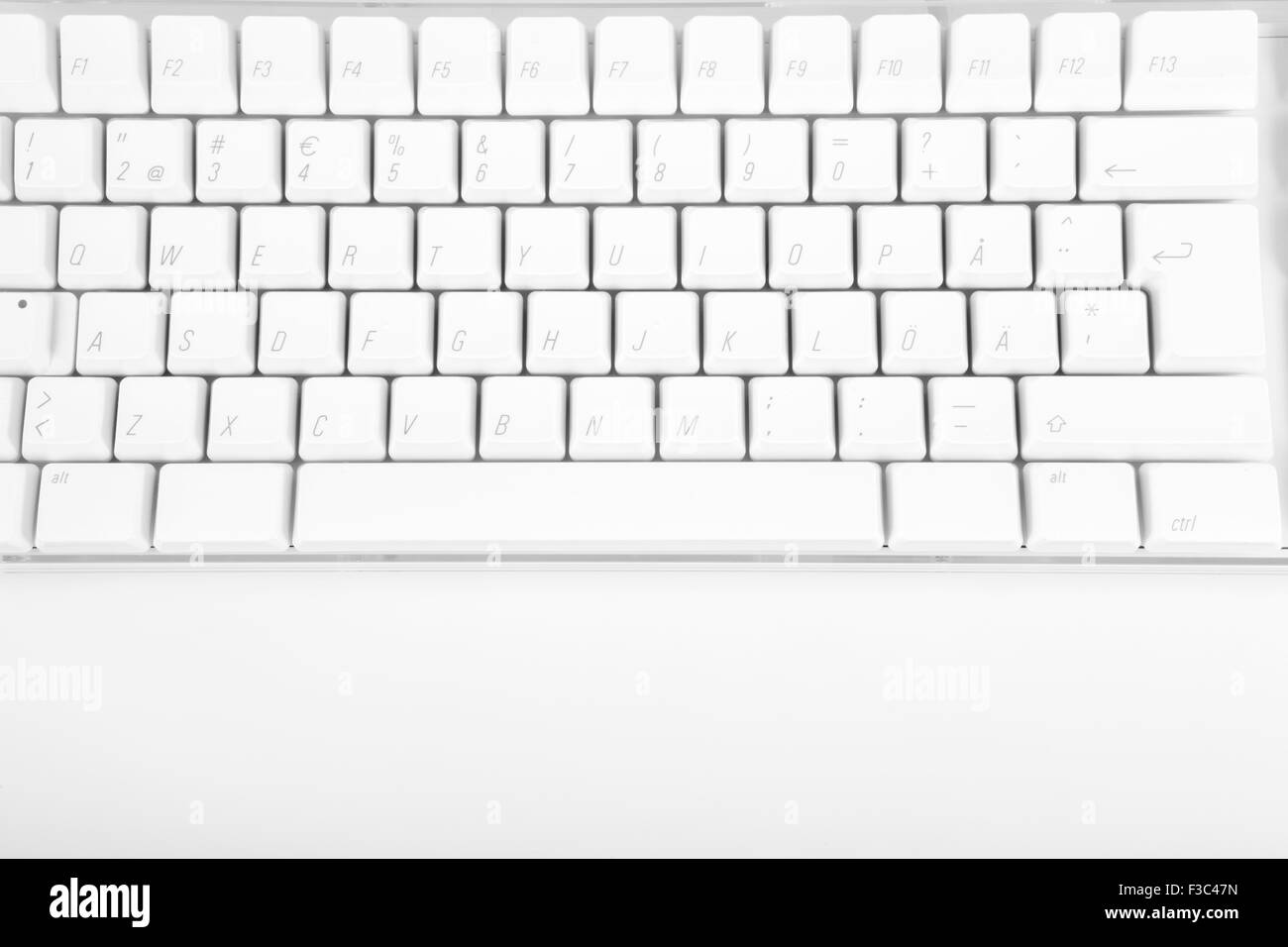 White computer keyboard on white background Stock Photo - Alamy
