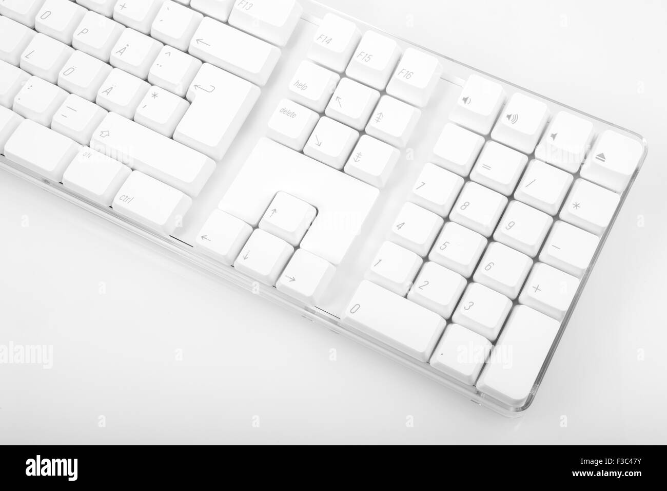 White computer keyboard on white background Stock Photo - Alamy