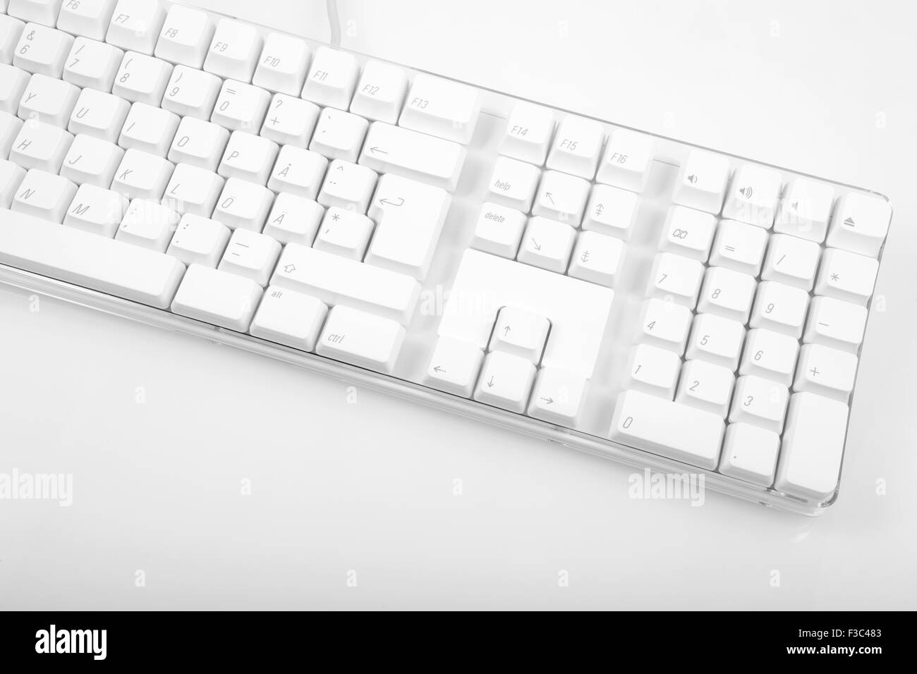 White computer keyboard on white background Stock Photo - Alamy