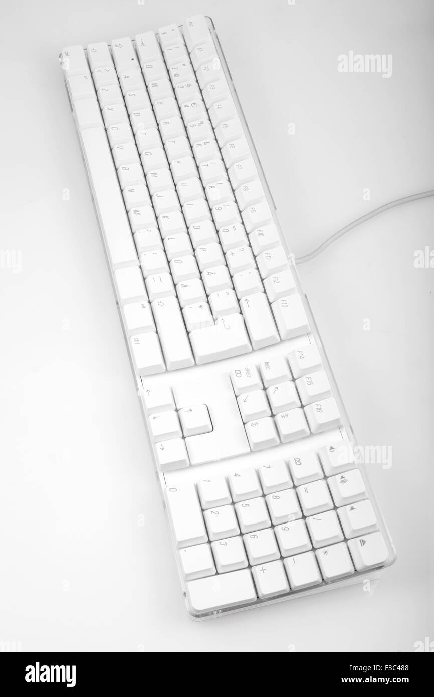 White computer keyboard on white background Stock Photo - Alamy