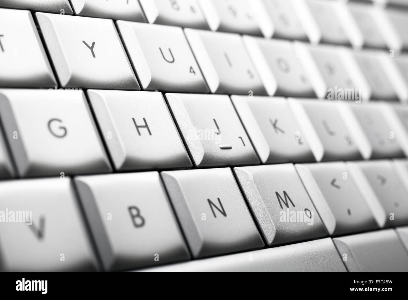 Keyboard of a notebook computer. White and black Stock Photo - Alamy