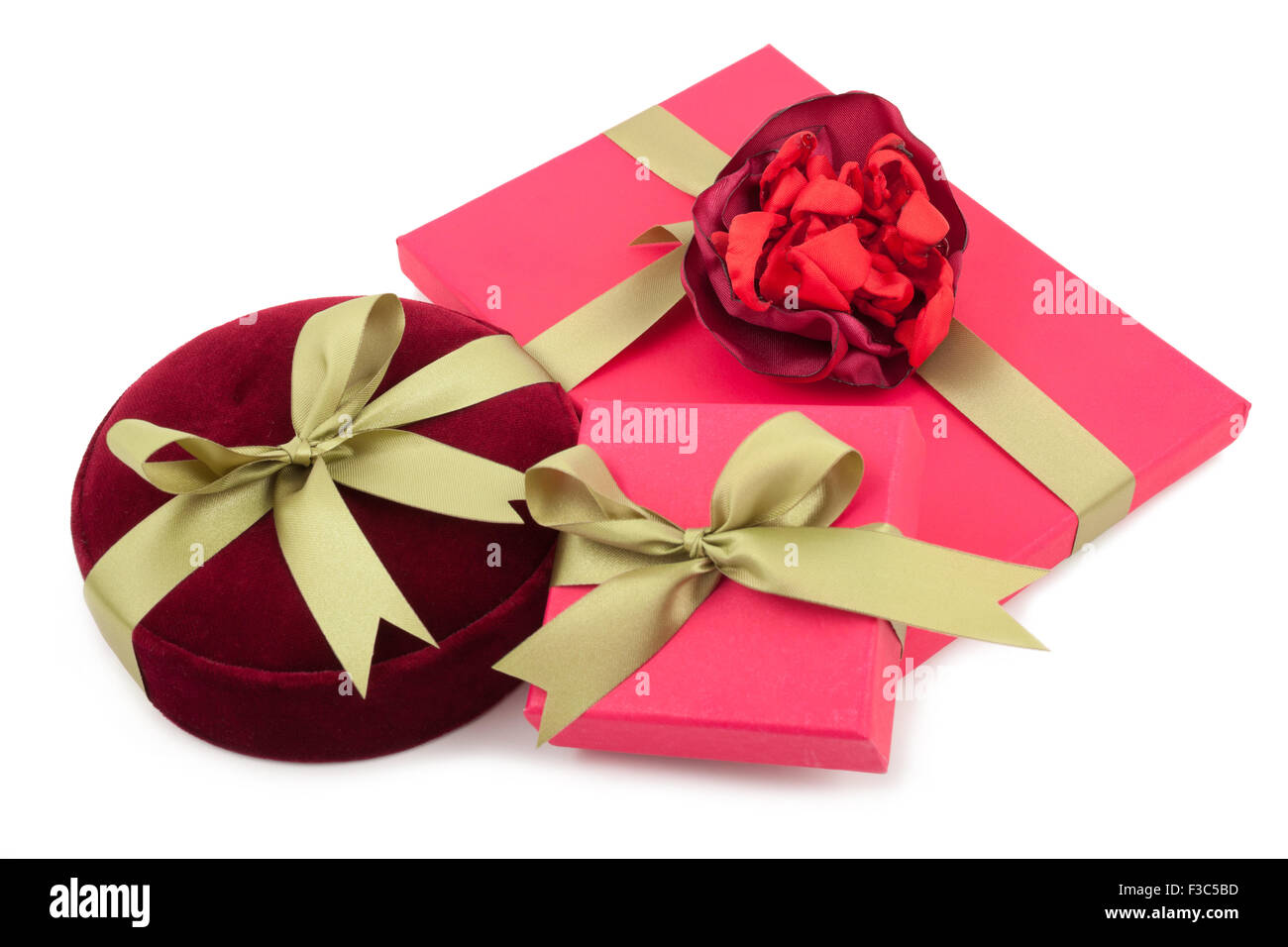 Luxury gift boxes in dark red and brown shades with green satin ribbon ...