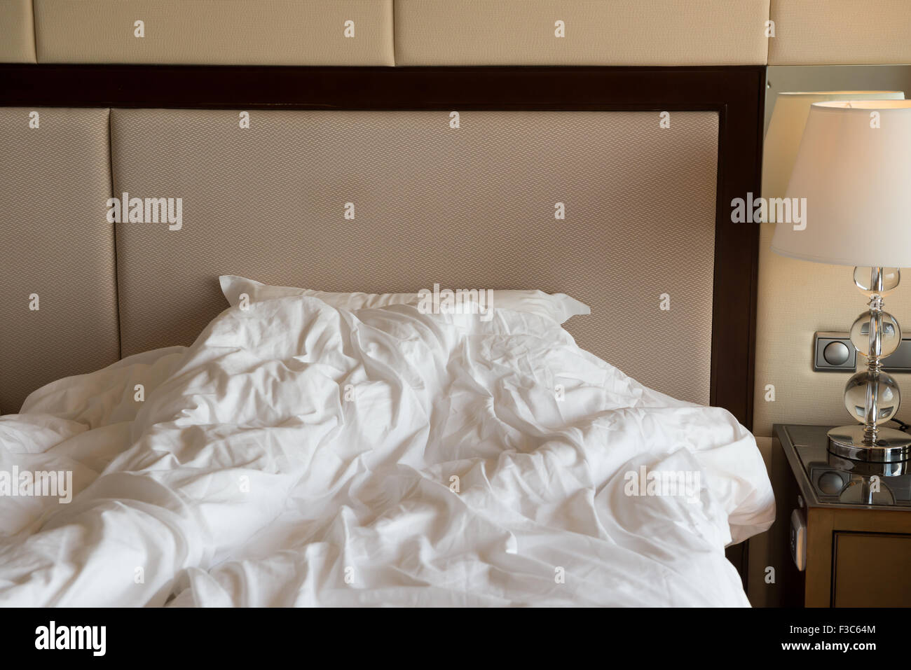 bed in a hotel room in the morning Stock Photo - Alamy