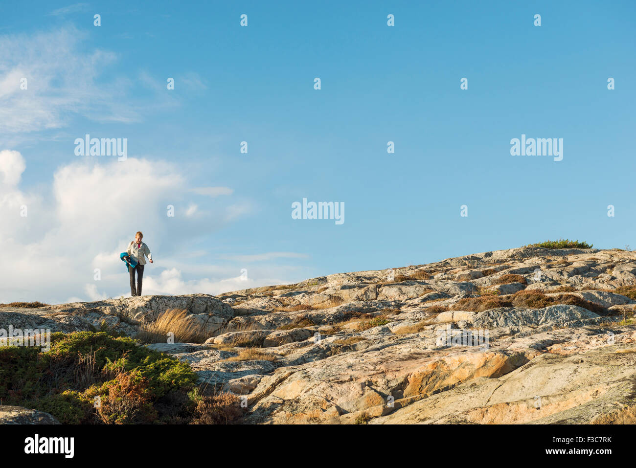 Walking on the rocks Stock Photo - Alamy