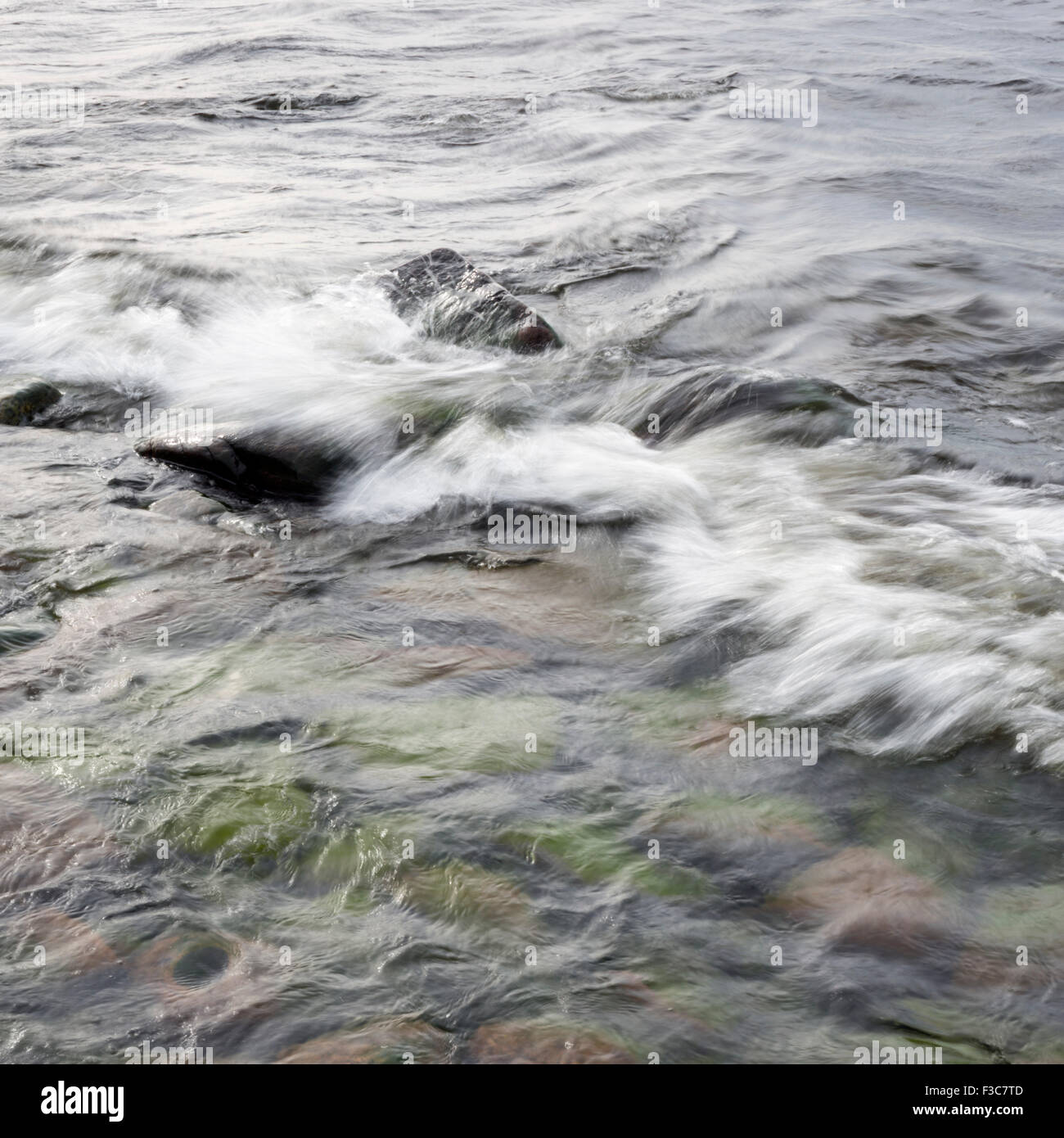 Small waves on beach hi-res stock photography and images - Alamy