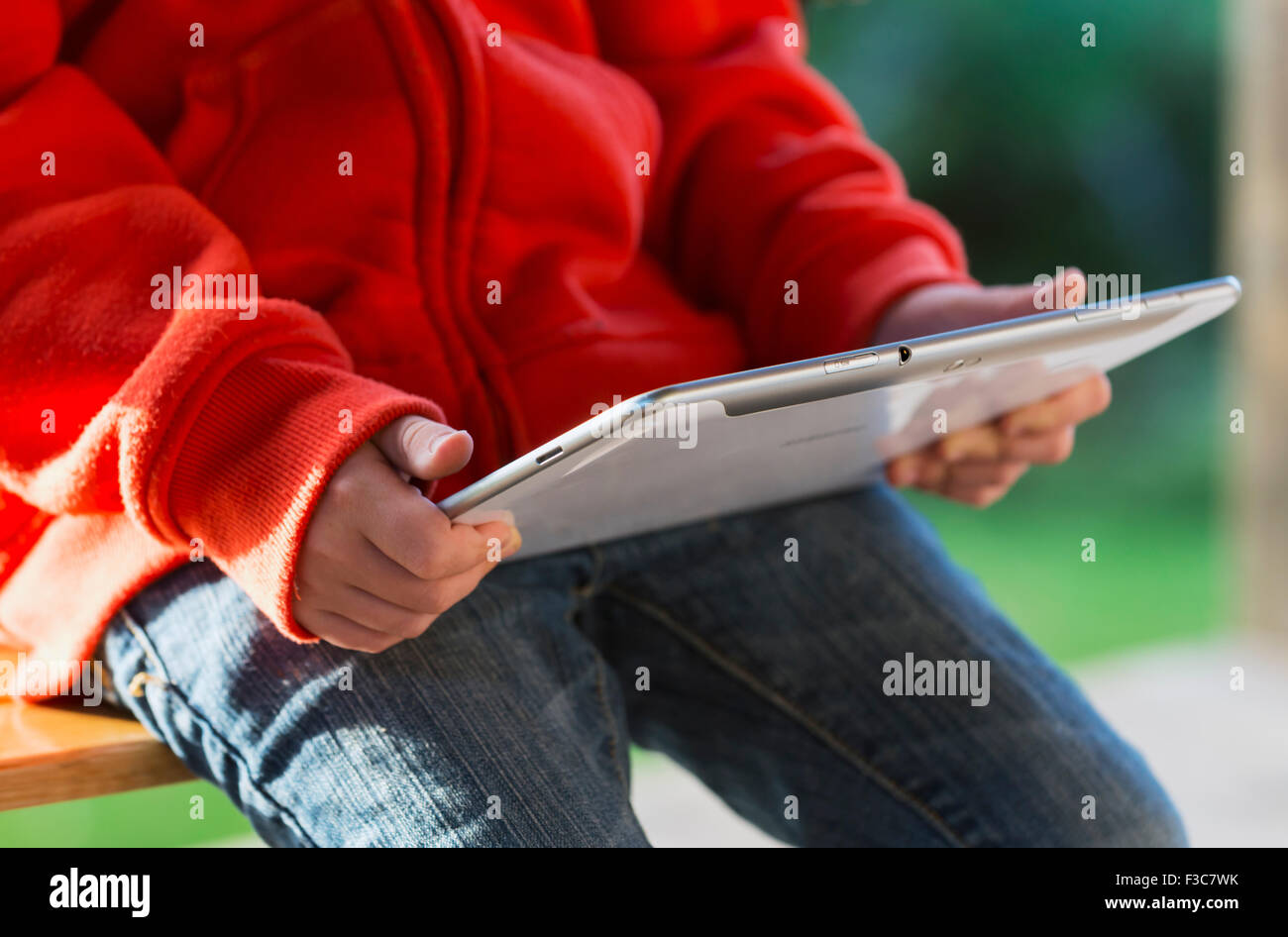 Young boy with Ipad Stock Photo - Alamy