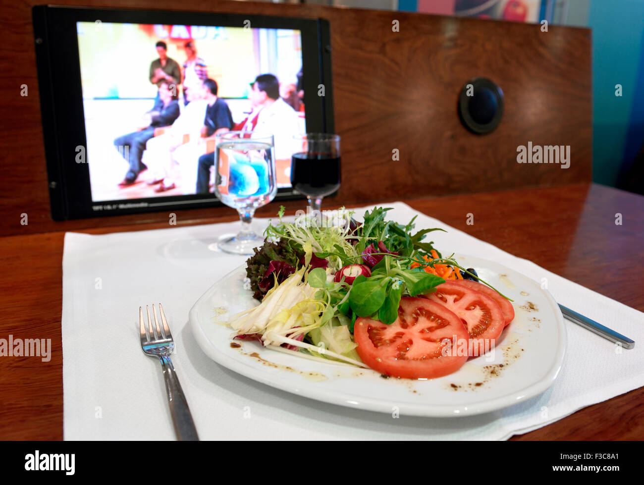 Lunch break healthy food while watching TV at Restaurant Stock Photo ...
